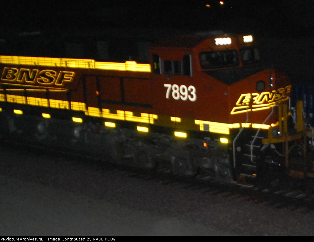 BNSF 7893 close up shot as she rolls east as a rear DPU Unit.